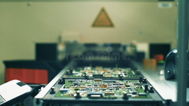 Worker Assembling Electronic Circuit Boards. Computer Factory Stock ...