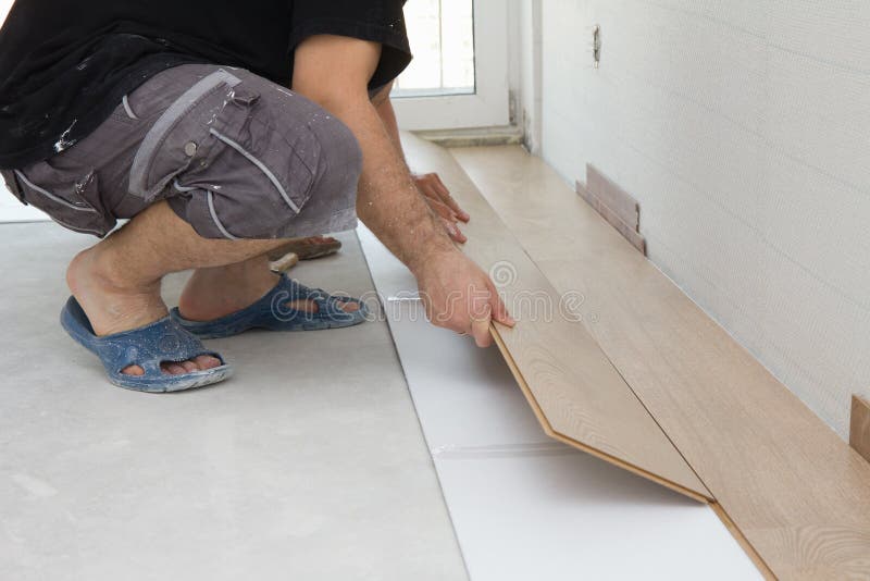 Worker Assembling Laminate Floor Stock Image - Image of carpenter ...