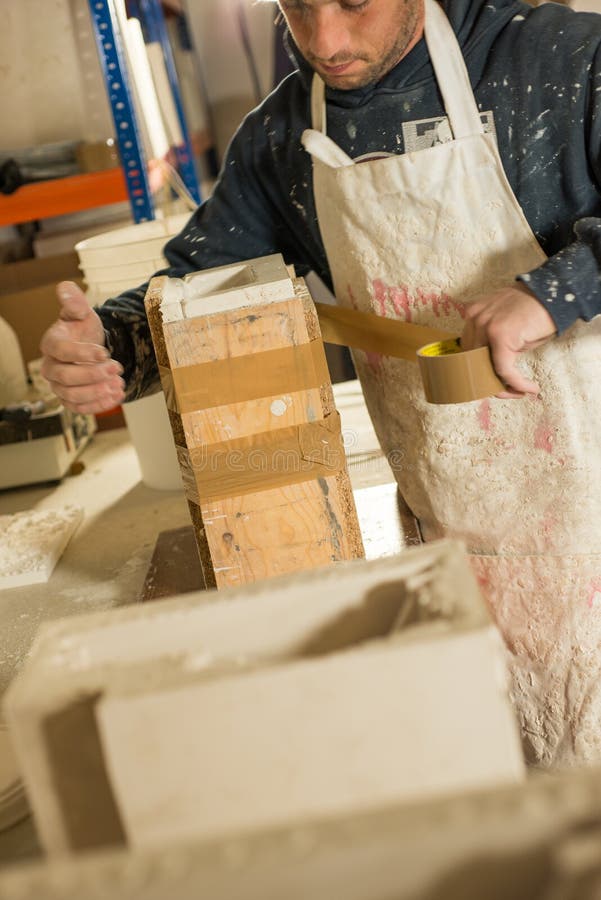 Worker Separating Plaster Model from Mold Stock Image - Image of person ...