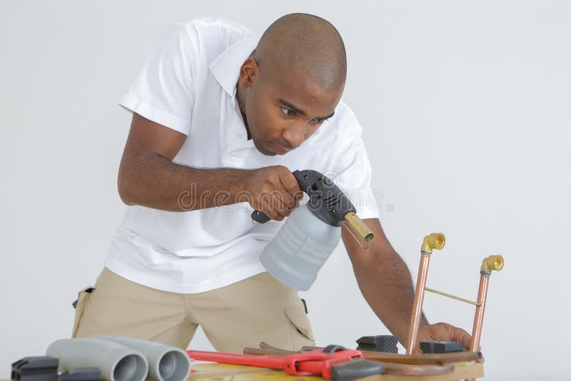 Worker Assembling the Pipes Stock Image - Image of labor, pipefitter ...