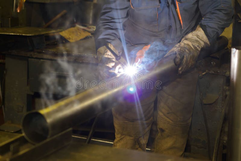 Worker assembly shop editorial stock photo. Image of welding - 89074403