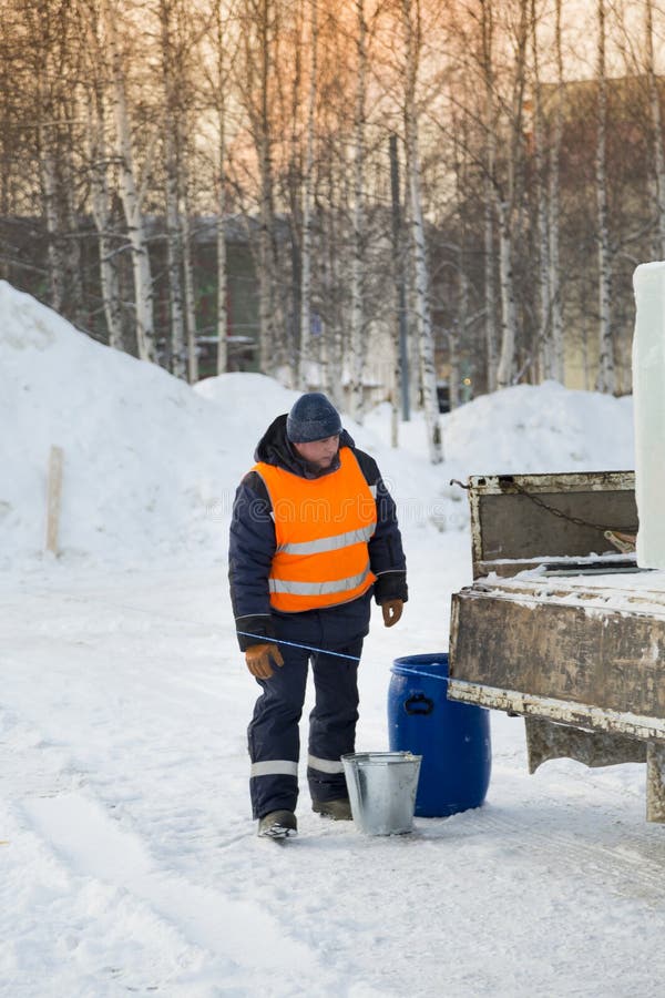 Worker at the Assembly Site of the Ice Town Stock Photo - Image of ...