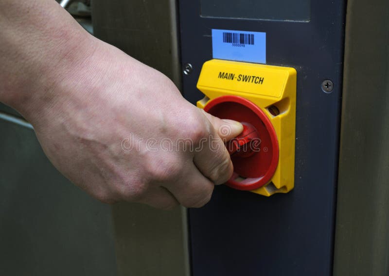 Worker Baker Hand Pressing Power Button on a Control Panel of an ...