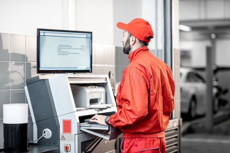 Worker Balancing Car Wheels at the Service Stock Image - Image of ...