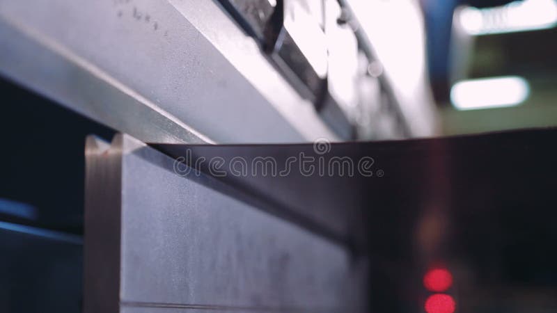 Worker Bend Metal Sheet on a Modern Bending Industrial Machine at a ...