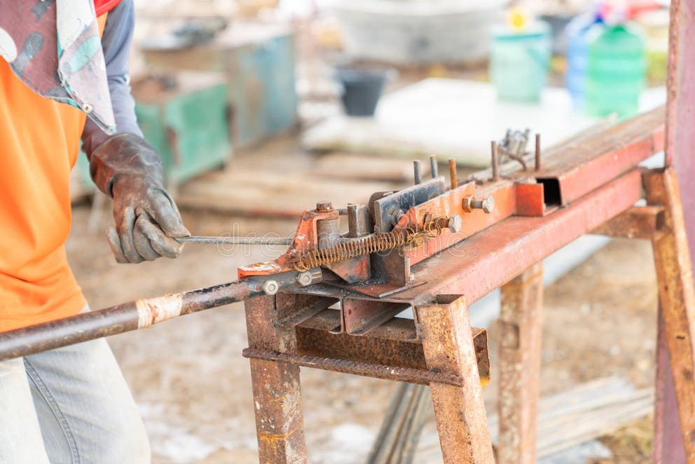 Worker is Bending Rebars with Deformation Patterns Stock Photo - Image of carbon, hydraulic ...