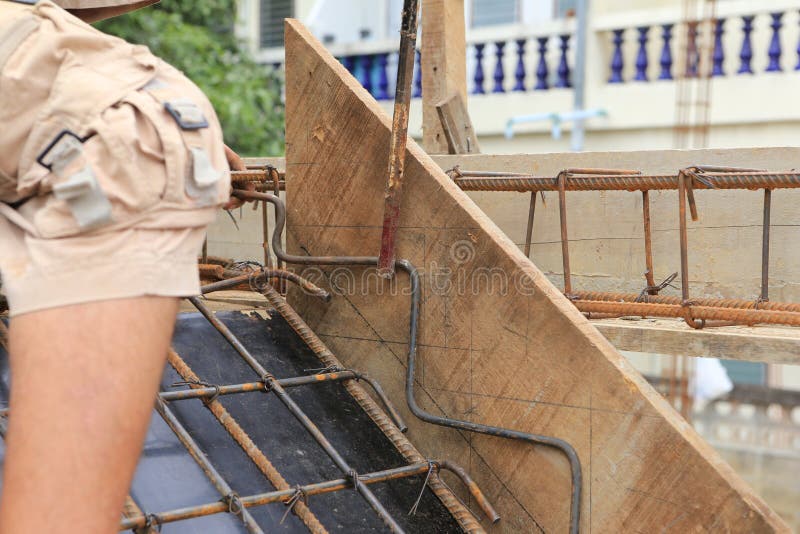 Worker Bending Steel for Construction Job Stock Photo - Image of ...