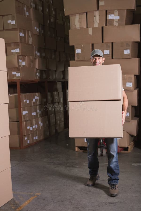 Worker with Boxes in Warehouse Stock Photo - Image of delivery ...