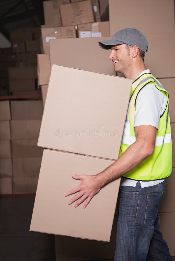 Worker with Boxes in Warehouse Stock Photo - Image of carrying ...