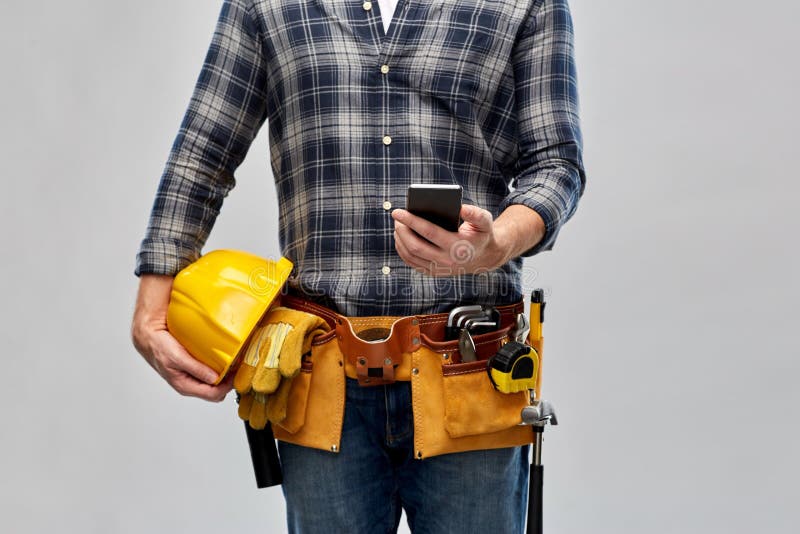 Worker or Builder with Phone and Working Tools Stock Image - Image of ...