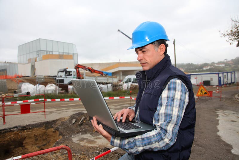 Worker on building site stock photo. Image of occupation - 16992070