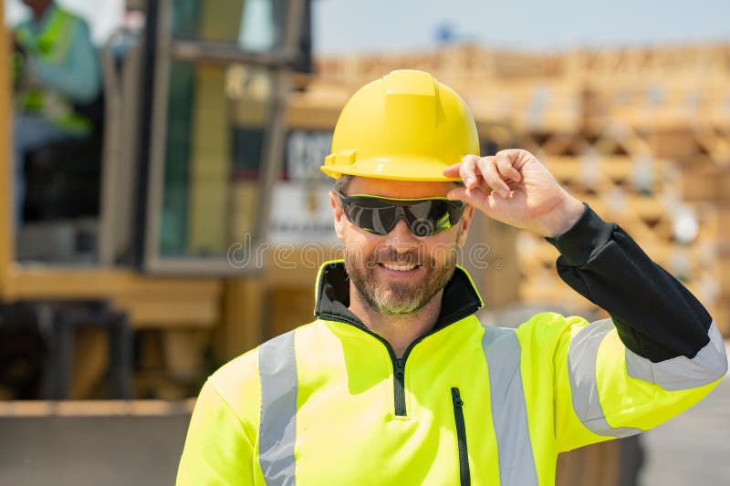 Worker in Building Uniform on Buildings Construction Background ...