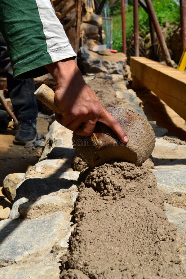 Worker Building Wall with Ladle Mortar Stock Photo - Image of outdoor ...