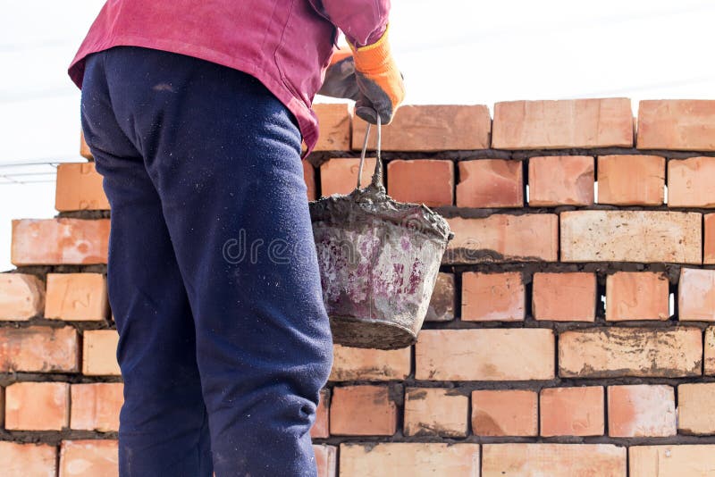 Worker Builds a Brick Wall in the House Stock Photo - Image of mortar ...