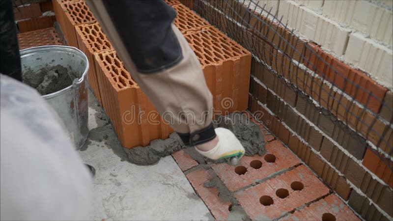 Industrial Worker Using Trowel and Tools for Building Exterior Walls ...