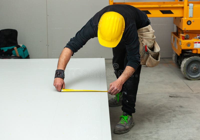 Worker Builds a Plasterboard Wall Stock Image - Image of profession ...