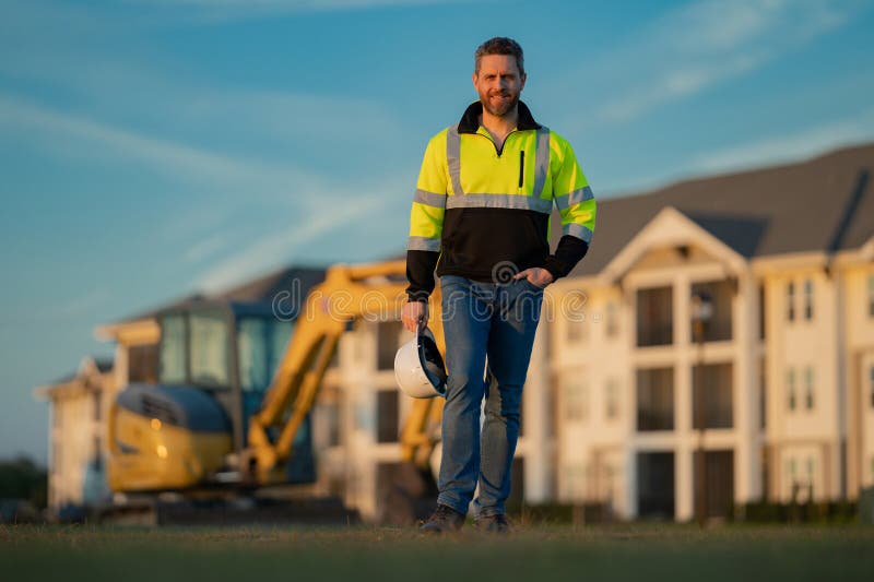 Worker with Bulldozer on the Building Construction. Stock Photo - Image ...