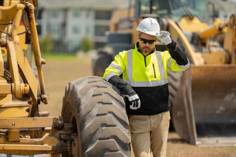 Worker with Bulldozer on Site Construction. Man Excavator Worker Stock ...