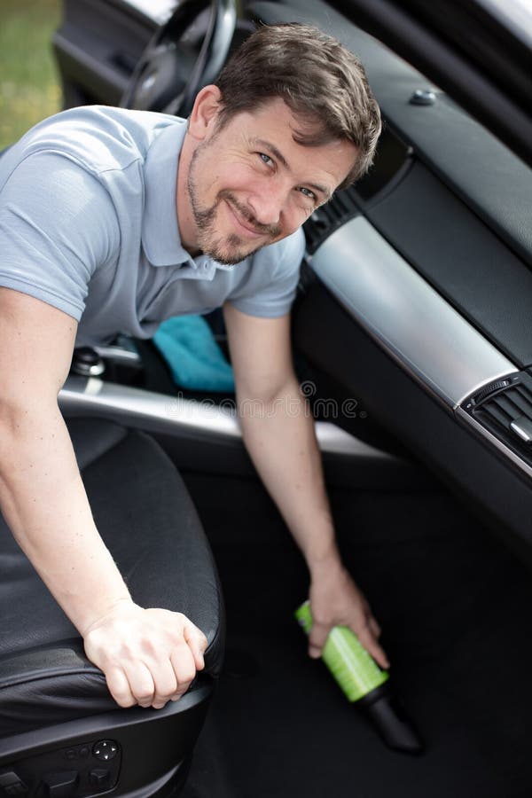 Worker on Car Wash Cleaning Car Interior Stock Image - Image of suds ...