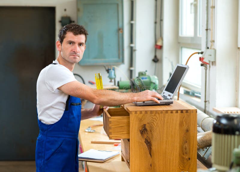 Worker in a Carpenter S Workshop with Computer Stock Image - Image of ...