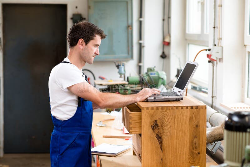 Worker in a Carpenter S Workshop with Computer Stock Photo - Image of ...