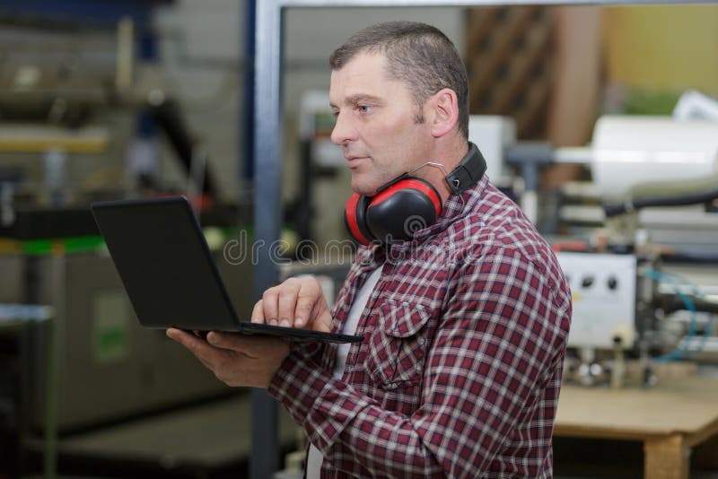 Worker in Carpenters Workshop with Computer Stock Image - Image of ...