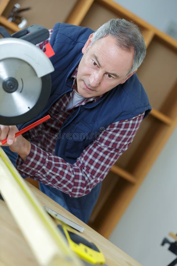 Worker in Carpenters Workshop Using Saw Machine Stock Image - Image of ...