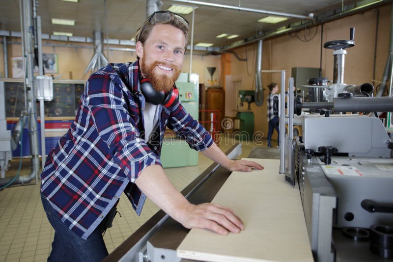 Worker in Carpenters Workshop Using Saw Machine Stock Image - Image of ...