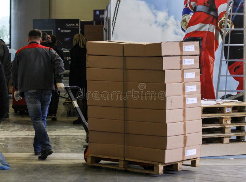 The Worker Carries the Packaging. Editorial Photo - Image of tool ...