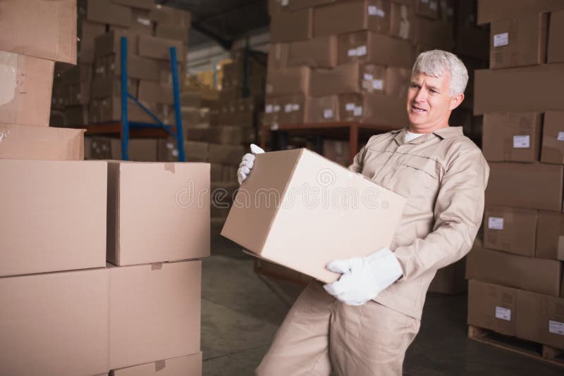 Worker Carrying Box in Warehouse Stock Image - Image of length ...