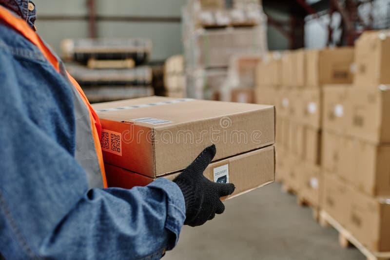 Worker Carrying Boxes for Distribution in Warehouse Stock Photo - Image ...