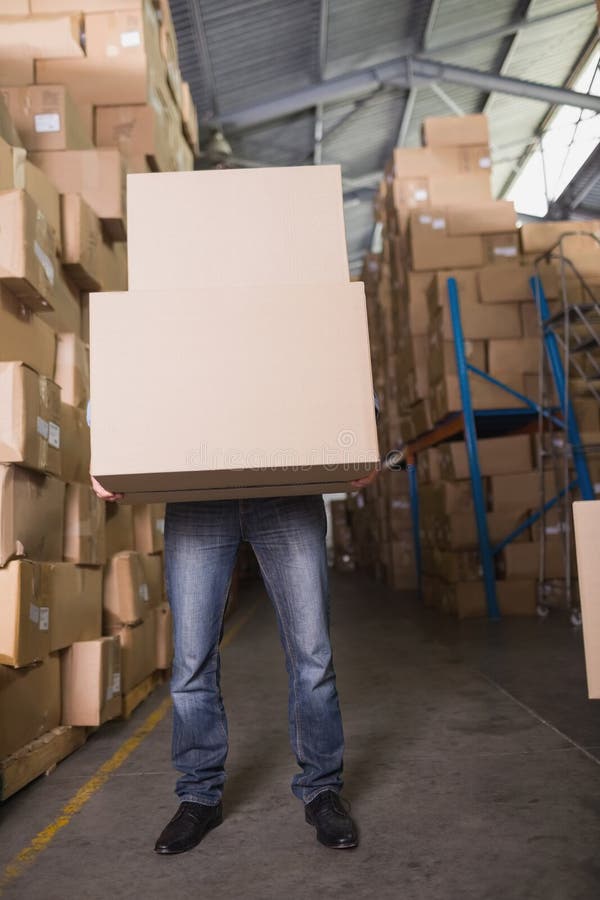 Worker Carrying Boxes in Warehouse Stock Photo - Image of industry ...