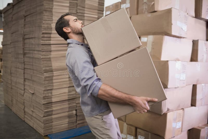 Worker Carrying Boxes in Warehouse Stock Photo - Image of distribution ...