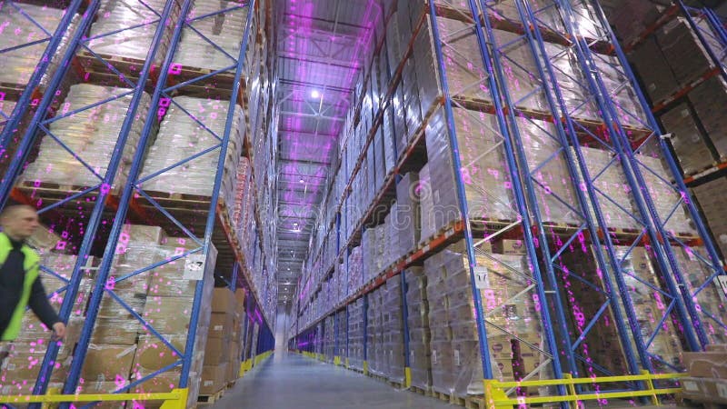 A Worker is Carrying a Rokla through a Large Warehouse. the Worker ... A Worker is Carrying a Rokla through a Large Warehouse. the Worker ...