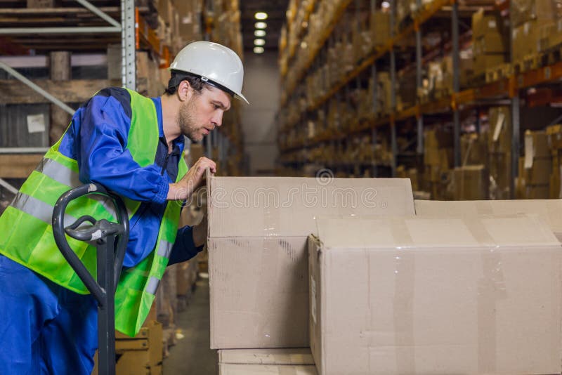 Worker Checking Boxes With Merchandise In Warehouse Stock Image - Image ...