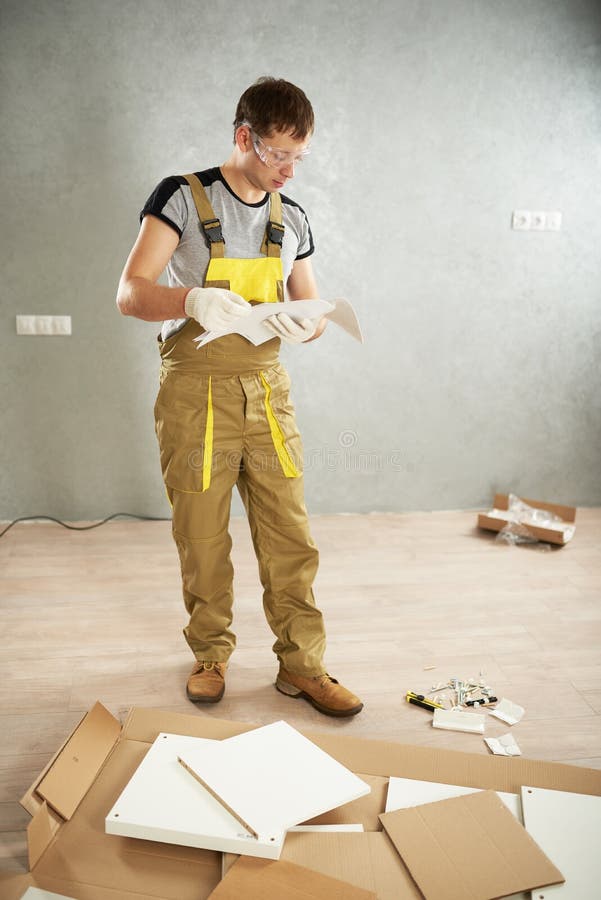 Worker Checking Instruction Stock Photo - Image of instructions ...