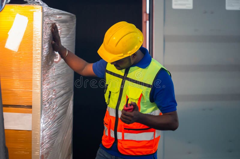 Worker Checking Inventory in Distribution Warehouse, Man Taking ...