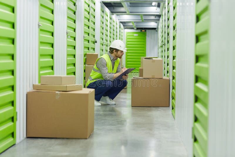 Worker Checking the Package Stock Photo - Image of pallet, container ...