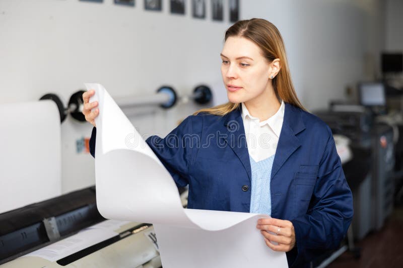 Woman Checking Large Format Paper after Printing Stock Image - Image of ...