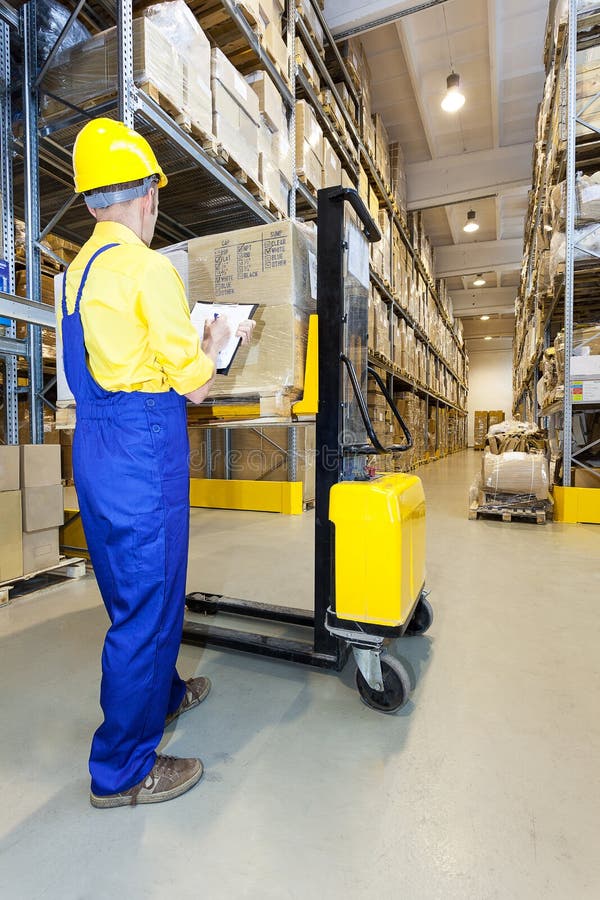 Experienced Worker with Box in Warehouse Stock Photo - Image of ...