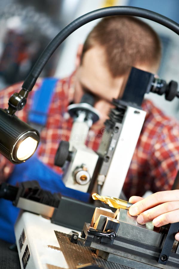 Worker Operating CNC Machine Center Stock Image - Image of lathe ... Worker Operating CNC Machine Center Stock Image - Image of lathe ...