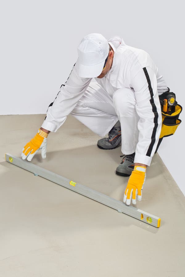 Worker Checks Cement Base Levels Stock Photo - Image of discs, level ...