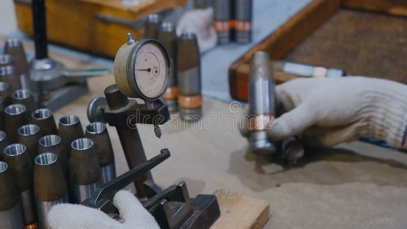 Worker Checks Workpieces for Bullets with Meter at Table Stock Video ...