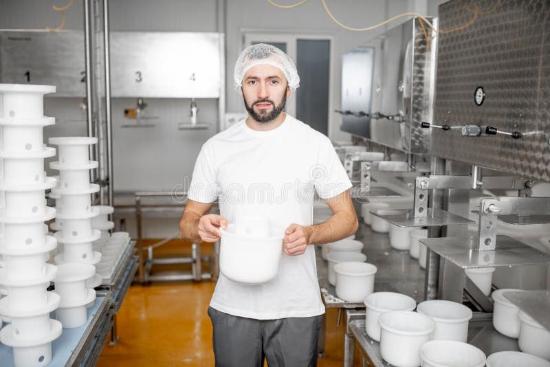 Worker at the Cheese Manufacturing Stock Photo - Image of machine ...