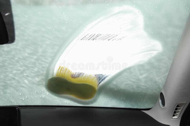 Worker Cleaning Automobile Windshield with Sponge at Car Wash Stock ...