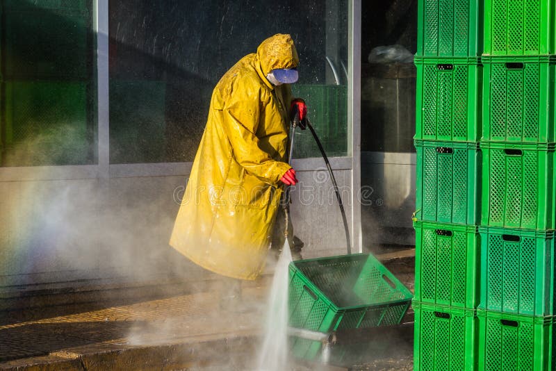 Worker Cleaning Boxes stock photo. Image of equipment - 50416184