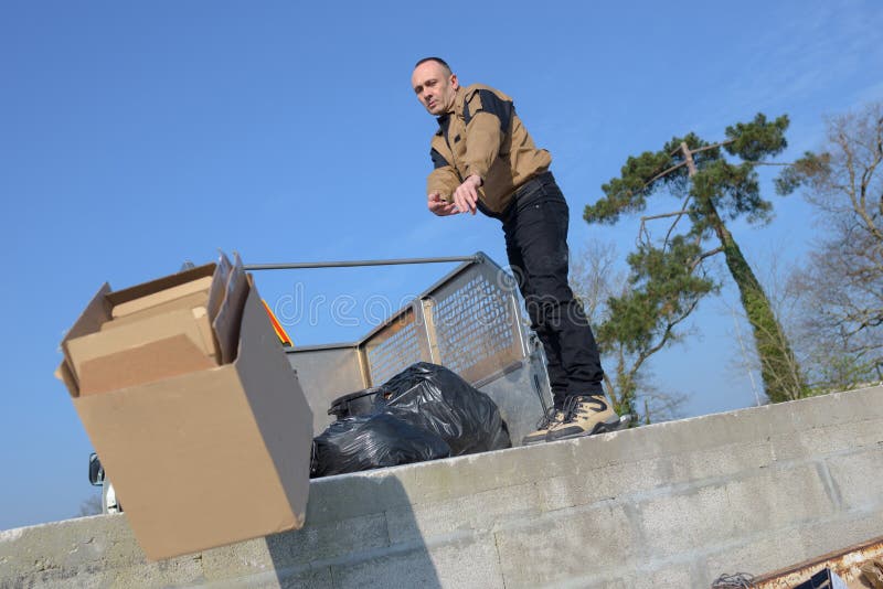 Worker Cleaning Company in Uniform with Garbage Bin Stock Image - Image ...