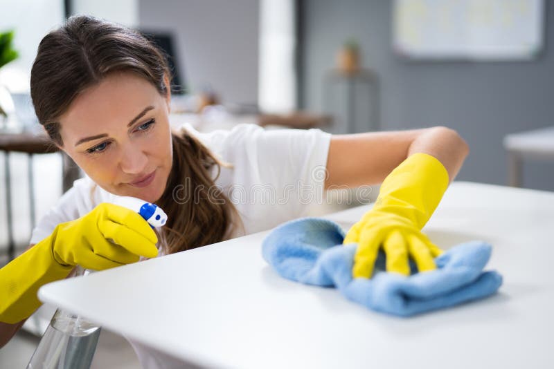 Worker Cleaning Desk with Rag Stock Photo - Image of business, desk ...