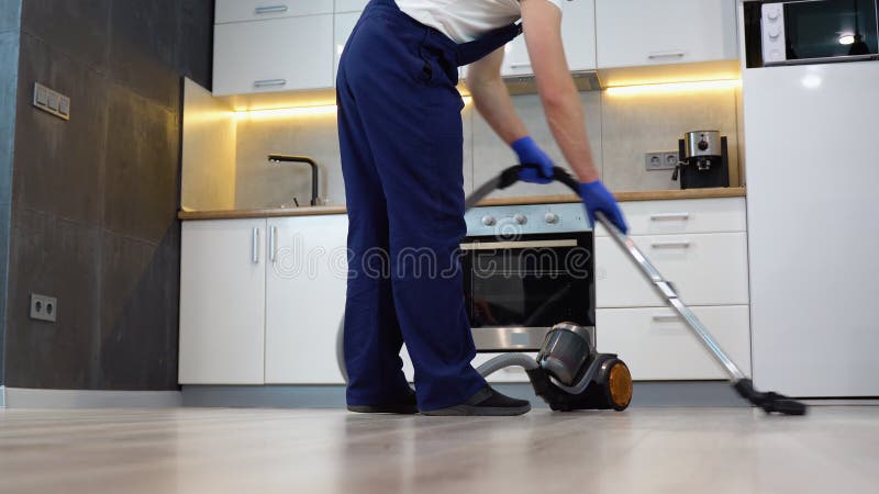 Worker Cleaning Floor with Vacuum Cleaner at Home Stock Footage - Video ...