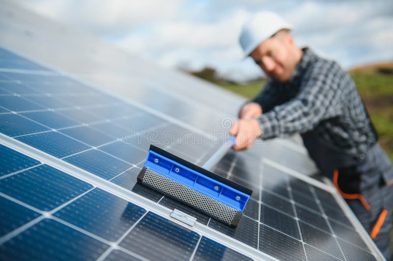 Worker Cleaning Solar Panels after Installation Outdoors Stock Image ...